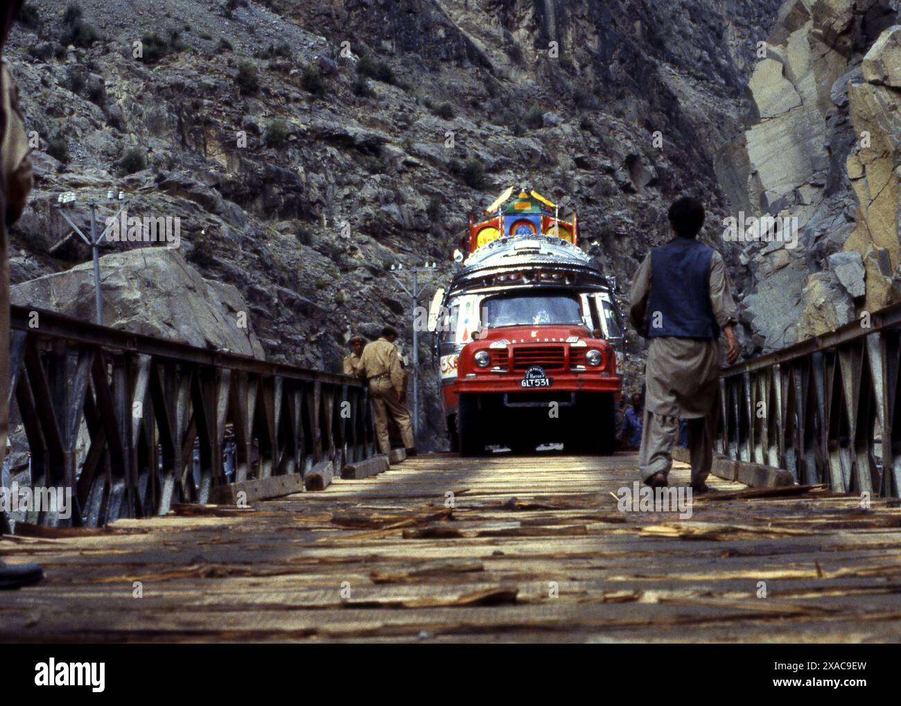 Gilgit areas, N. Pakistan. Emergency bridge repair after flooding 1984 ...