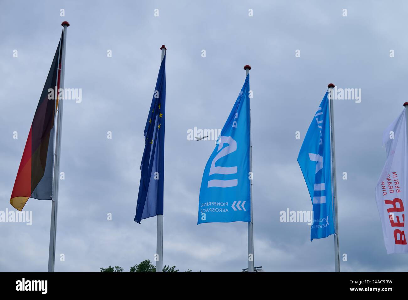 Berlin, Germany. 05th June, 2024. While the flags of the International Aerospace Exhibition (ILA ...