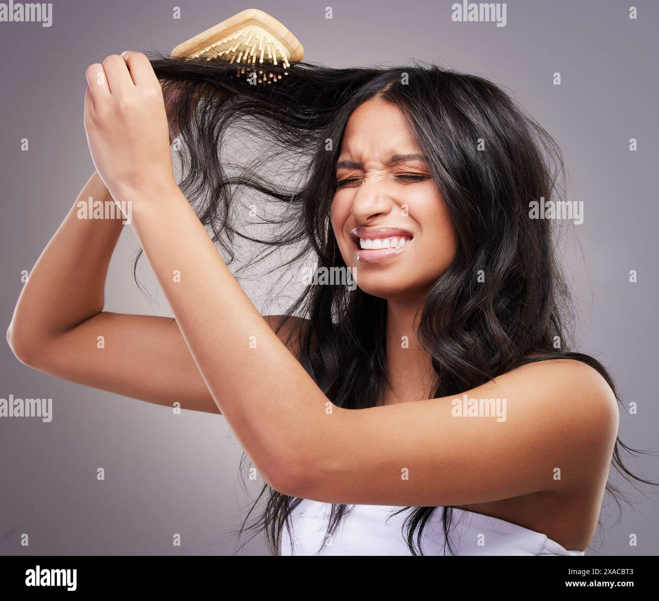 Brush, frustrated and woman with tangled hair for grooming mistake ...