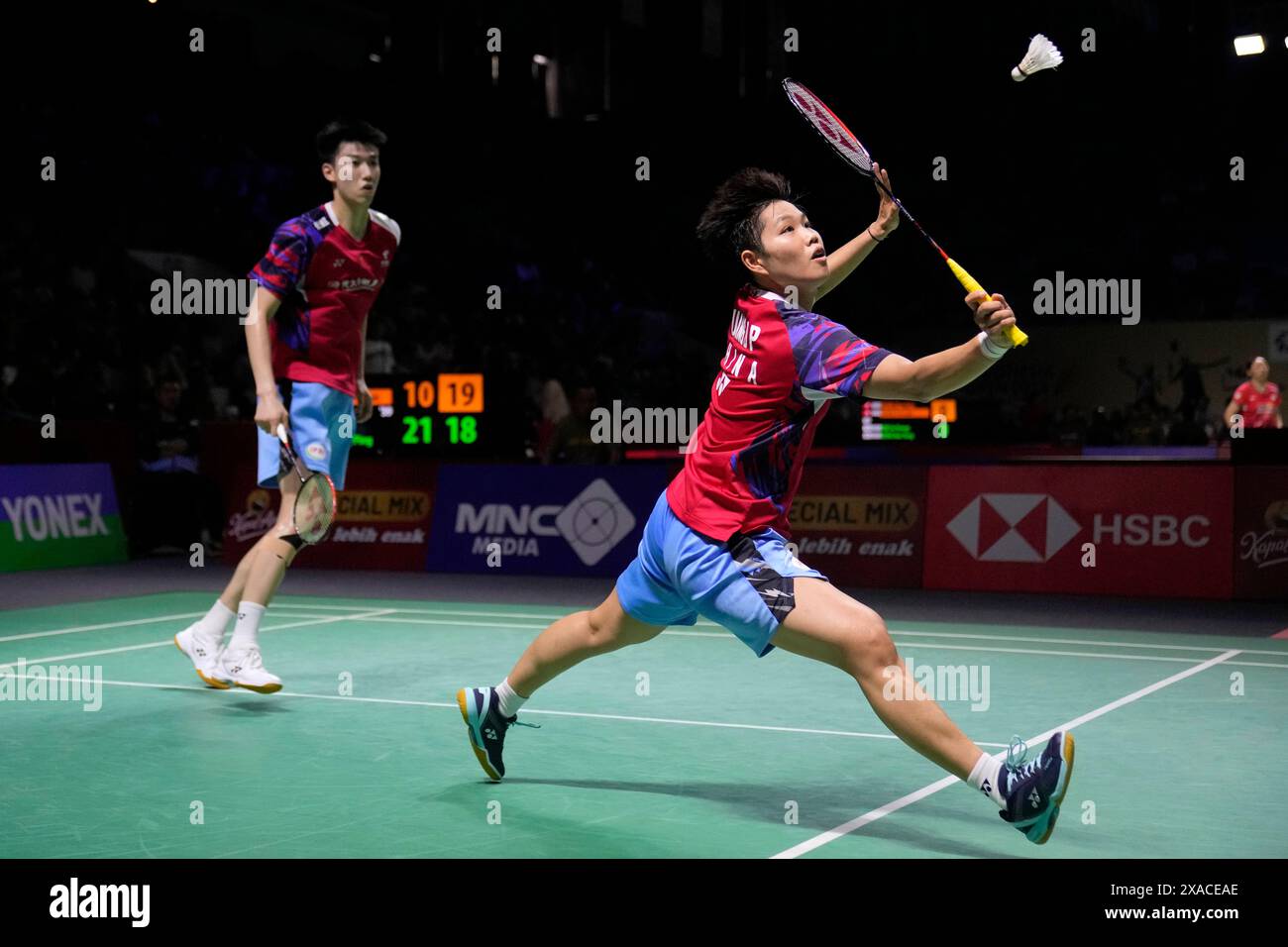 China's Feng Yan Zhe, left, and Huang Dong Ping play against Japan's ...