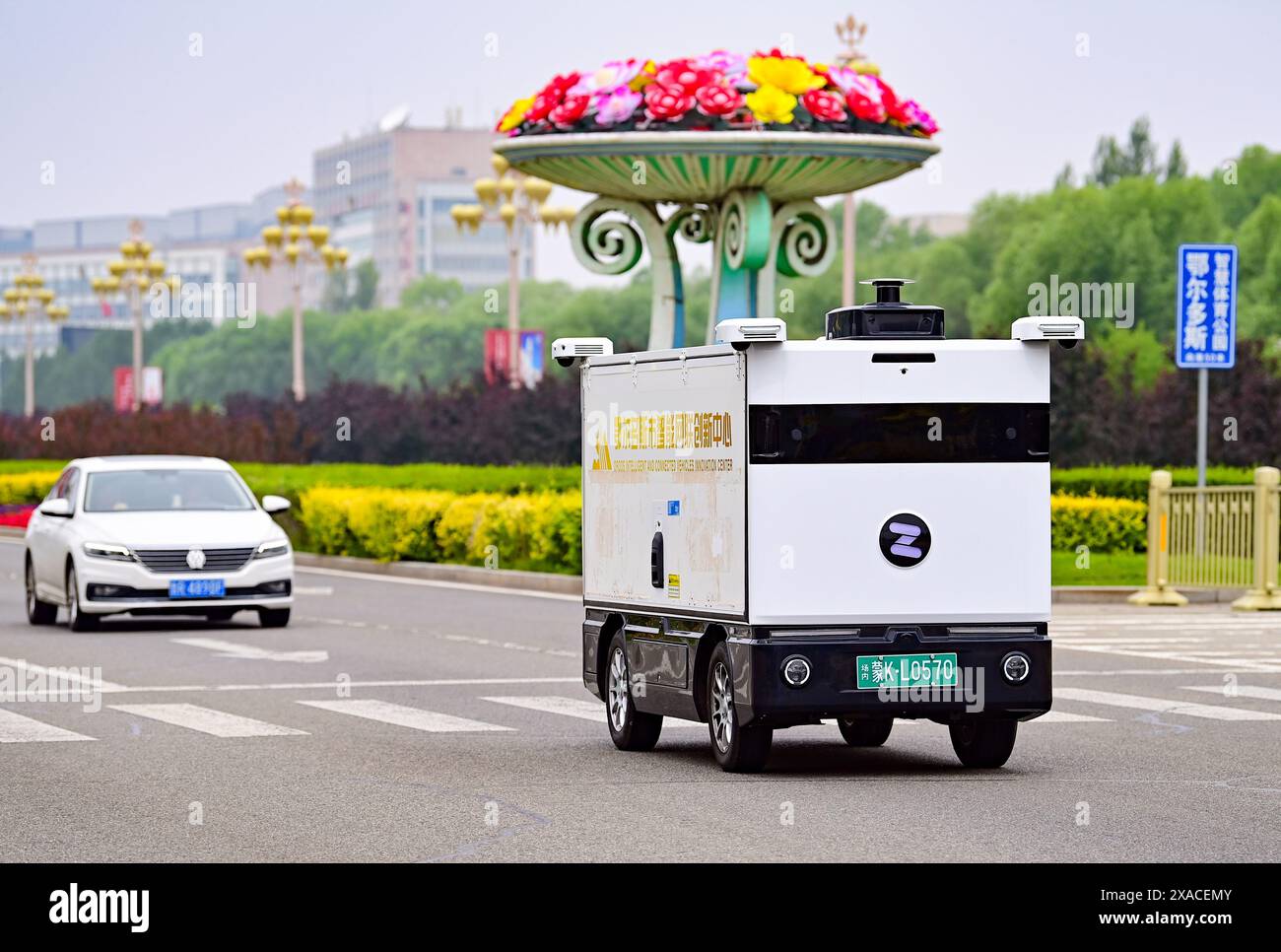 ORDOS, CHINA - JUNE 6, 2024 - A driverless logistics delivery vehicle ...