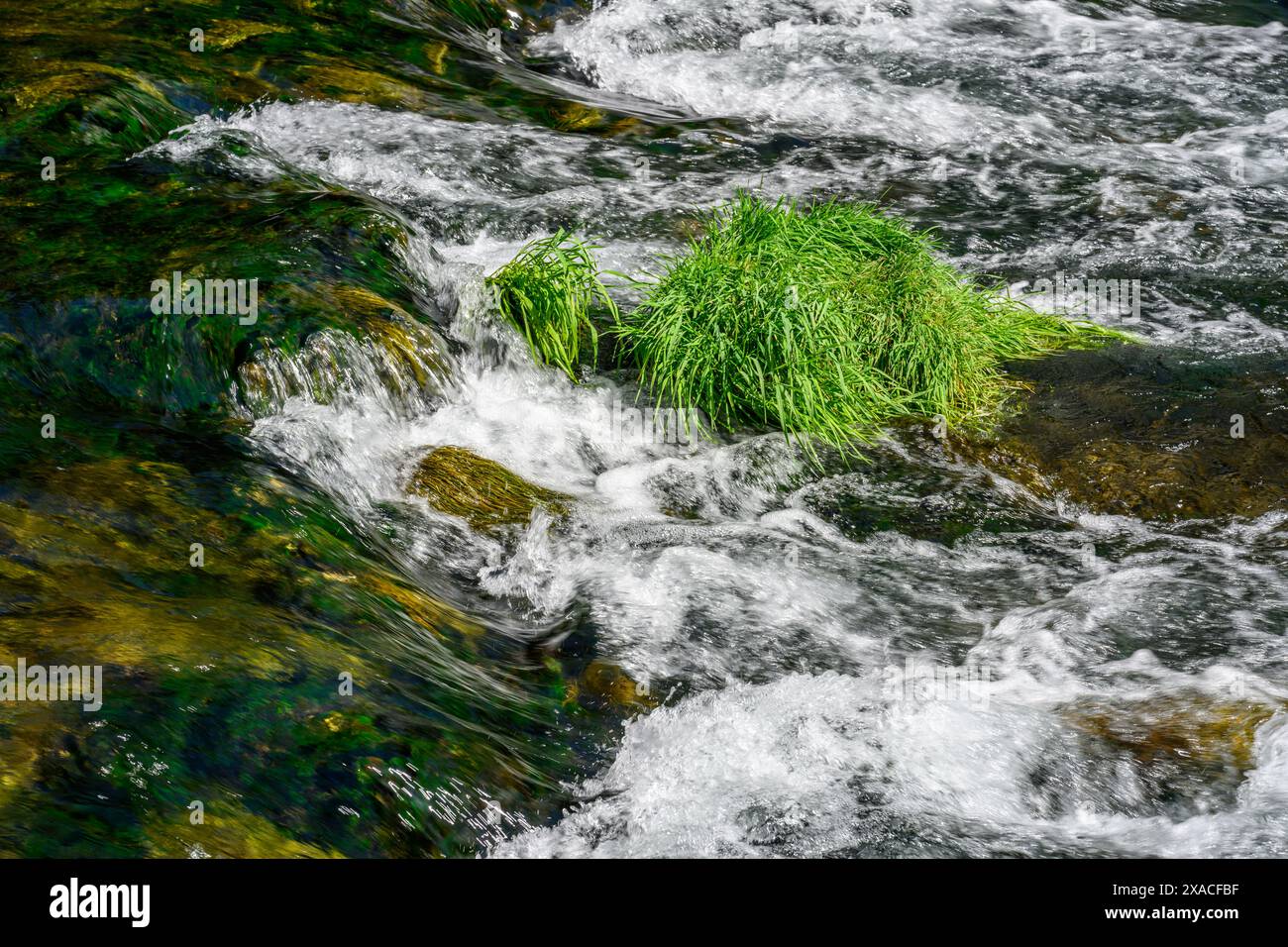 River flowing through rocks photographed with long exposure technique ...