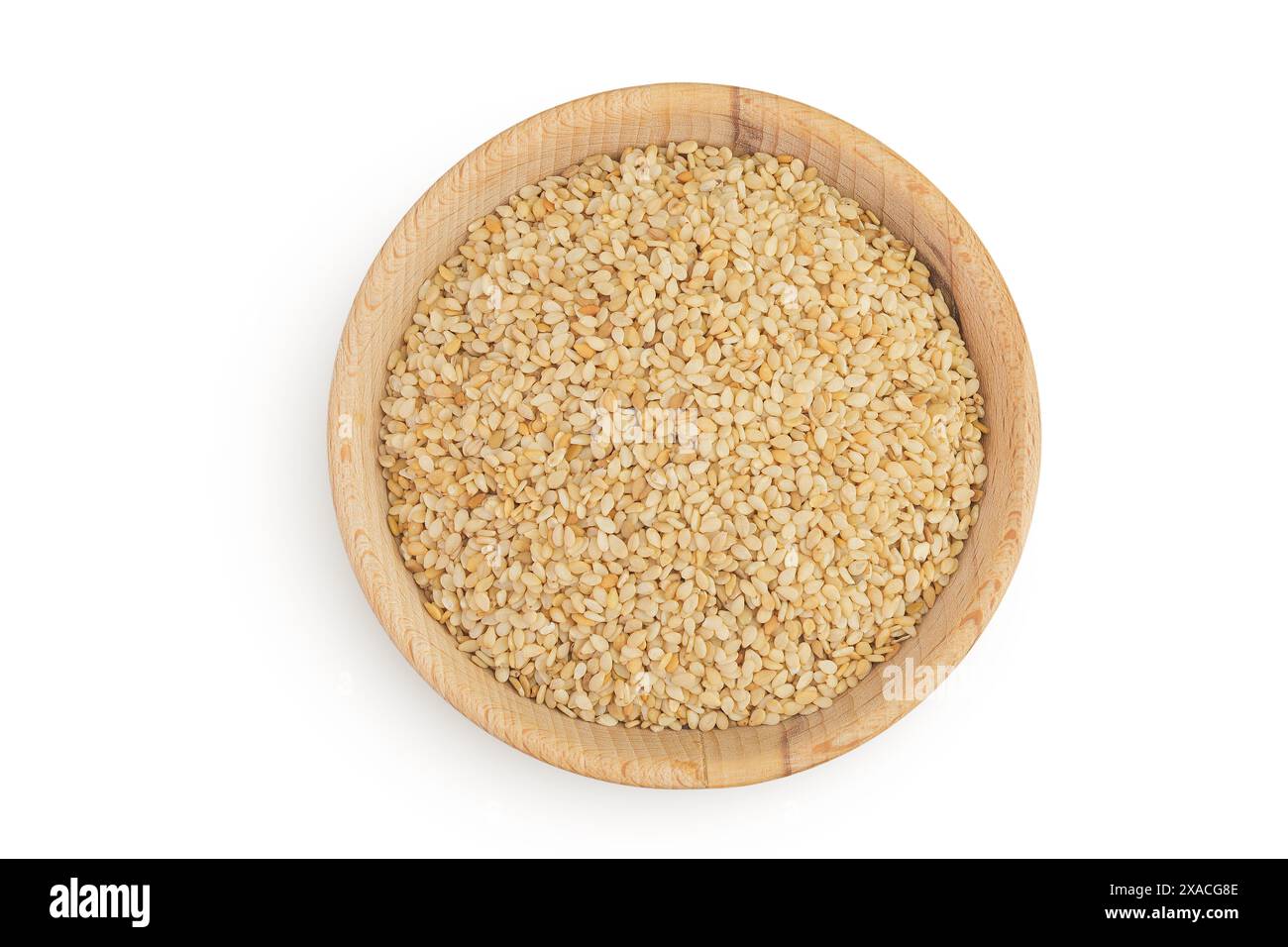Sesame seeds in wooden bowl isolated on white background. Top view ...