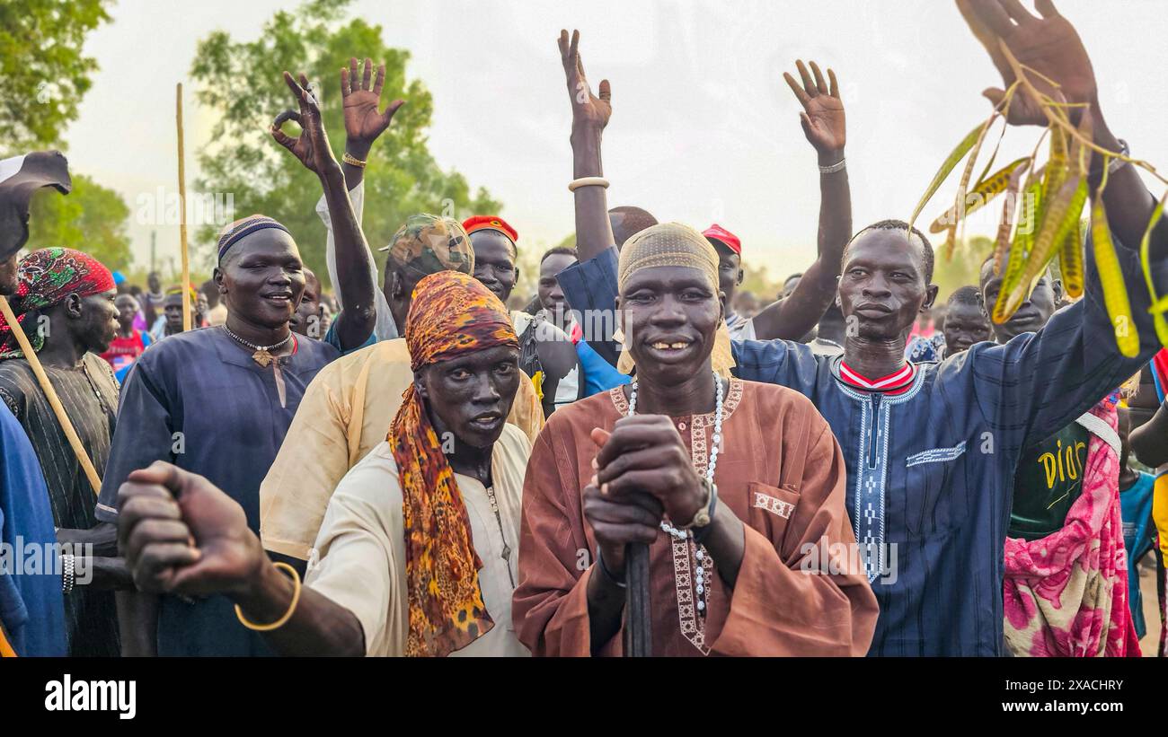 Locals dancing at a traditional Dinka wedding, Bor, central region ...