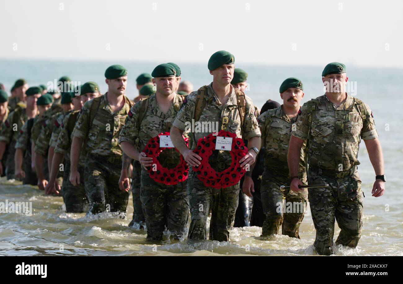 A beach landing by the Royal Marines of 47 Commando at Asnelles before ...