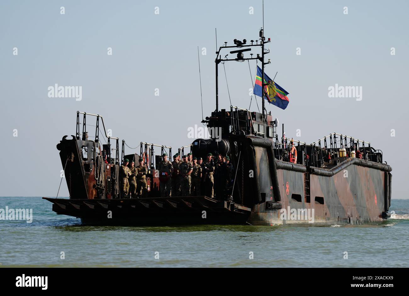A beach landing by the Royal Marines of 47 Commando at Asnelles before ...