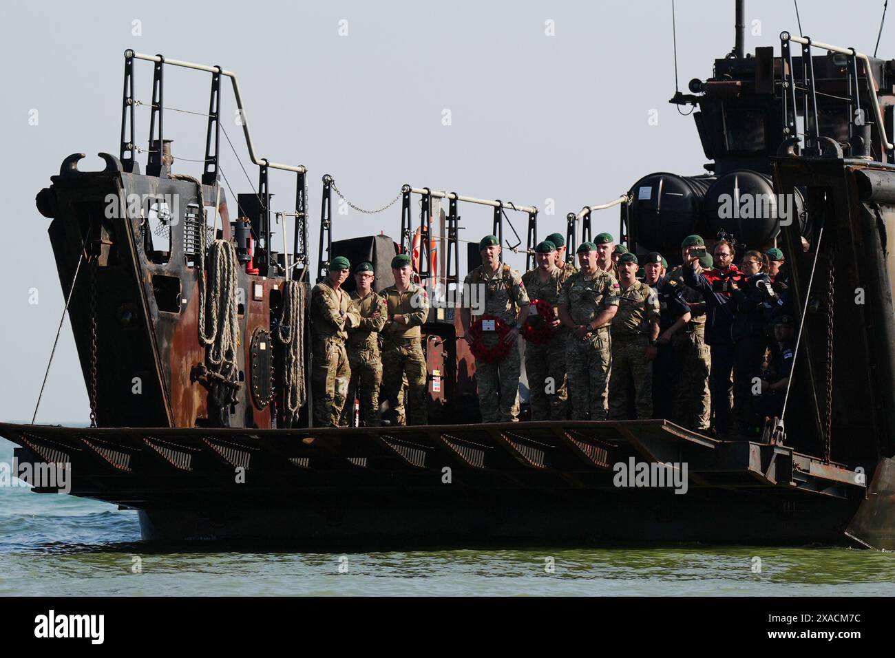 A beach landing by the Royal Marines of 47 Commando at Asnelles before their annual 'yomp' to ...