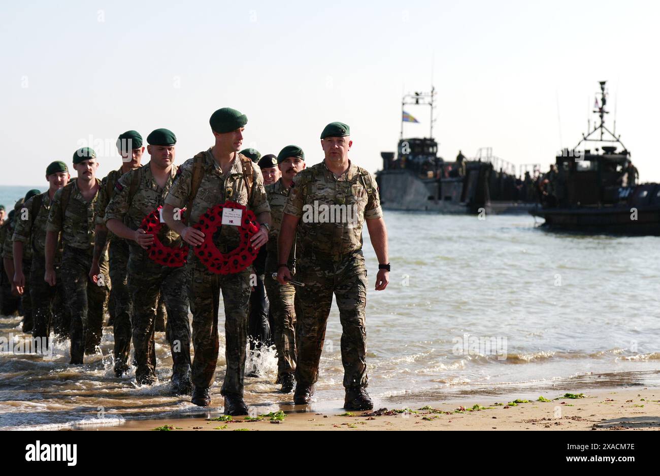 A beach landing by the Royal Marines of 47 Commando at Asnelles before their annual 'yomp' to ...