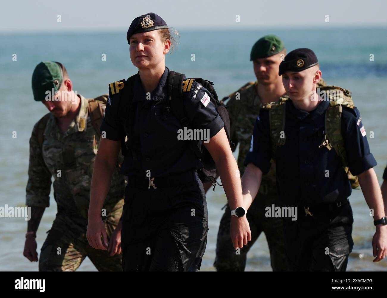 A beach landing by the Royal Marines of 47 Commando at Asnelles before their annual 'yomp' to ...