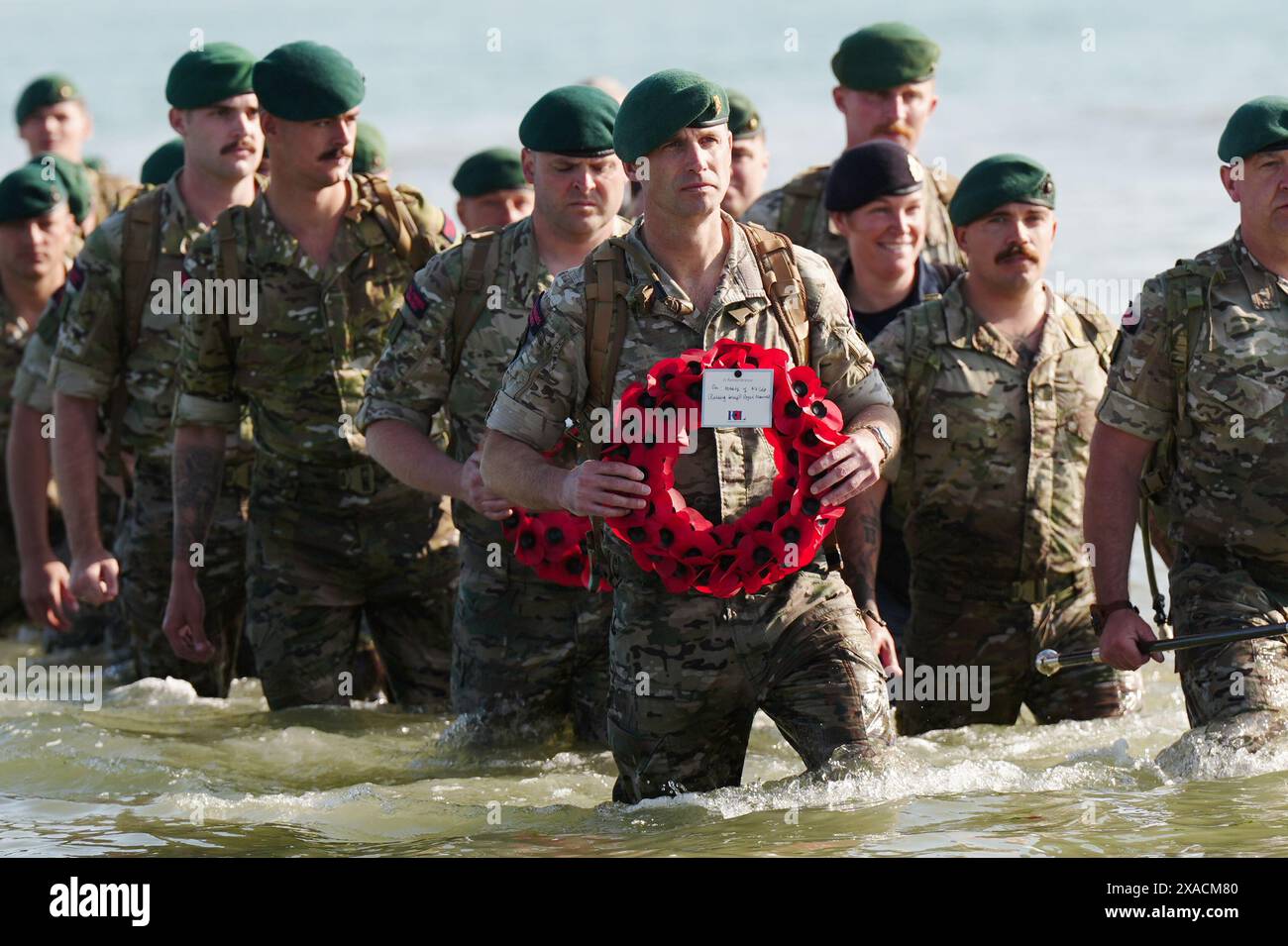 A beach landing by the Royal Marines of 47 Commando at Asnelles before their annual 'yomp' to ...