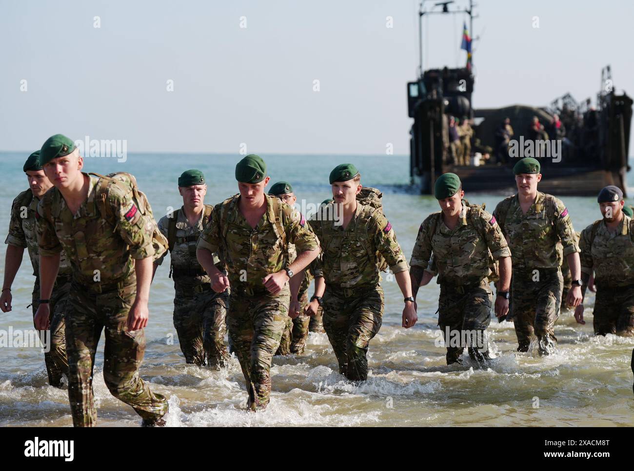 A beach landing by the Royal Marines of 47 Commando at Asnelles before their annual 'yomp' to ...