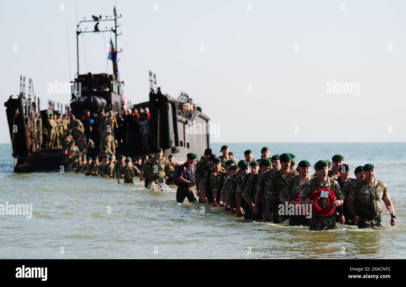 A beach landing by the Royal Marines of 47 Commando at Asnelles before ...