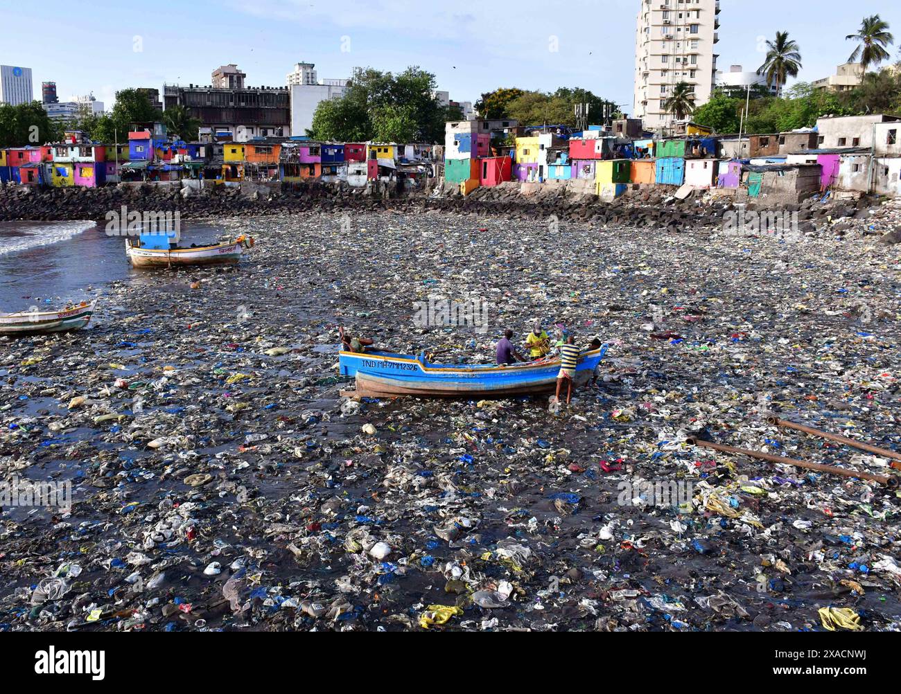 MUMBAI, INDIA - JUNE 5: Fisherman prepared to escalate fishing boat ...