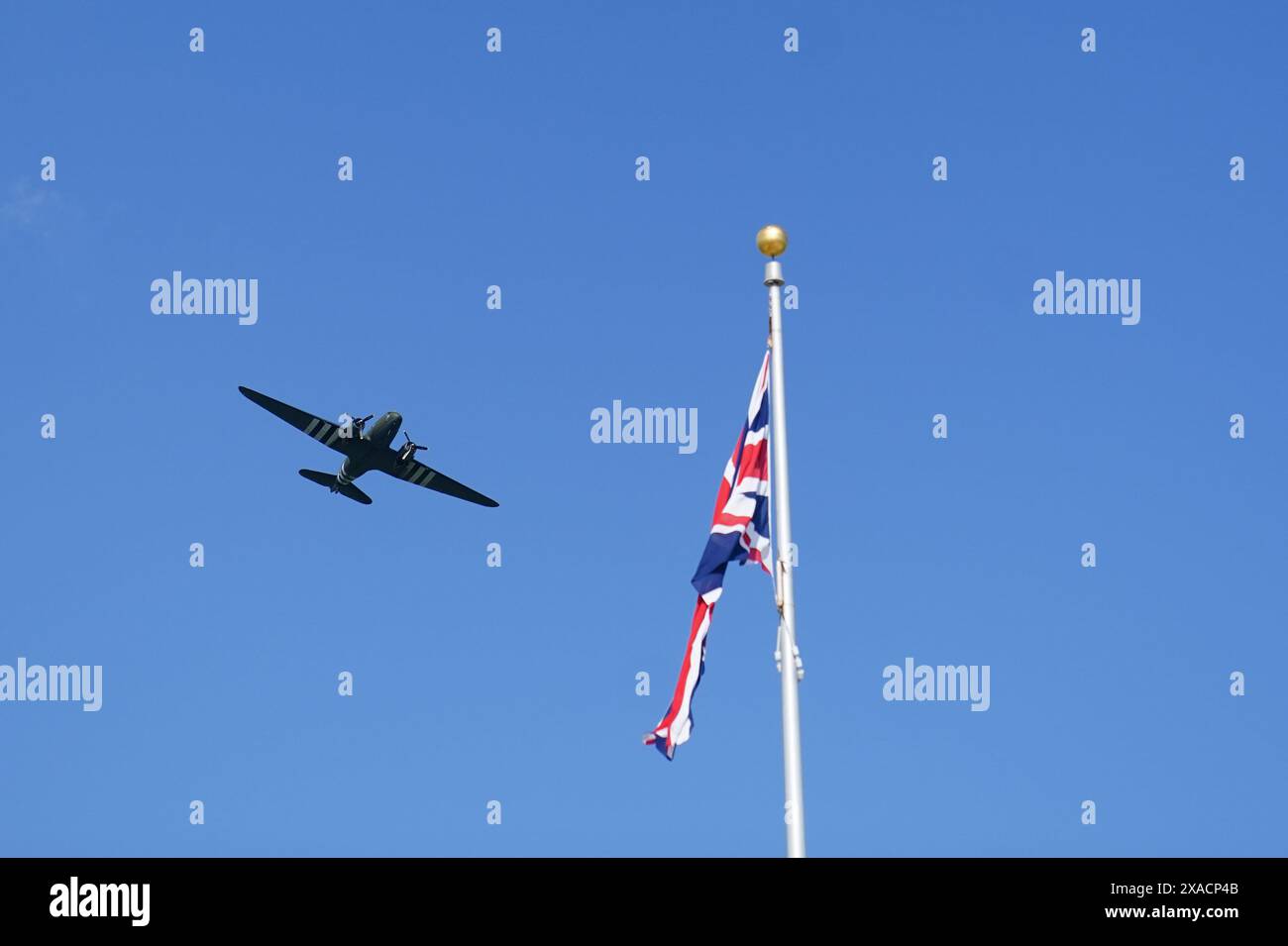 A military plane flies over the UK national commemorative event for the ...
