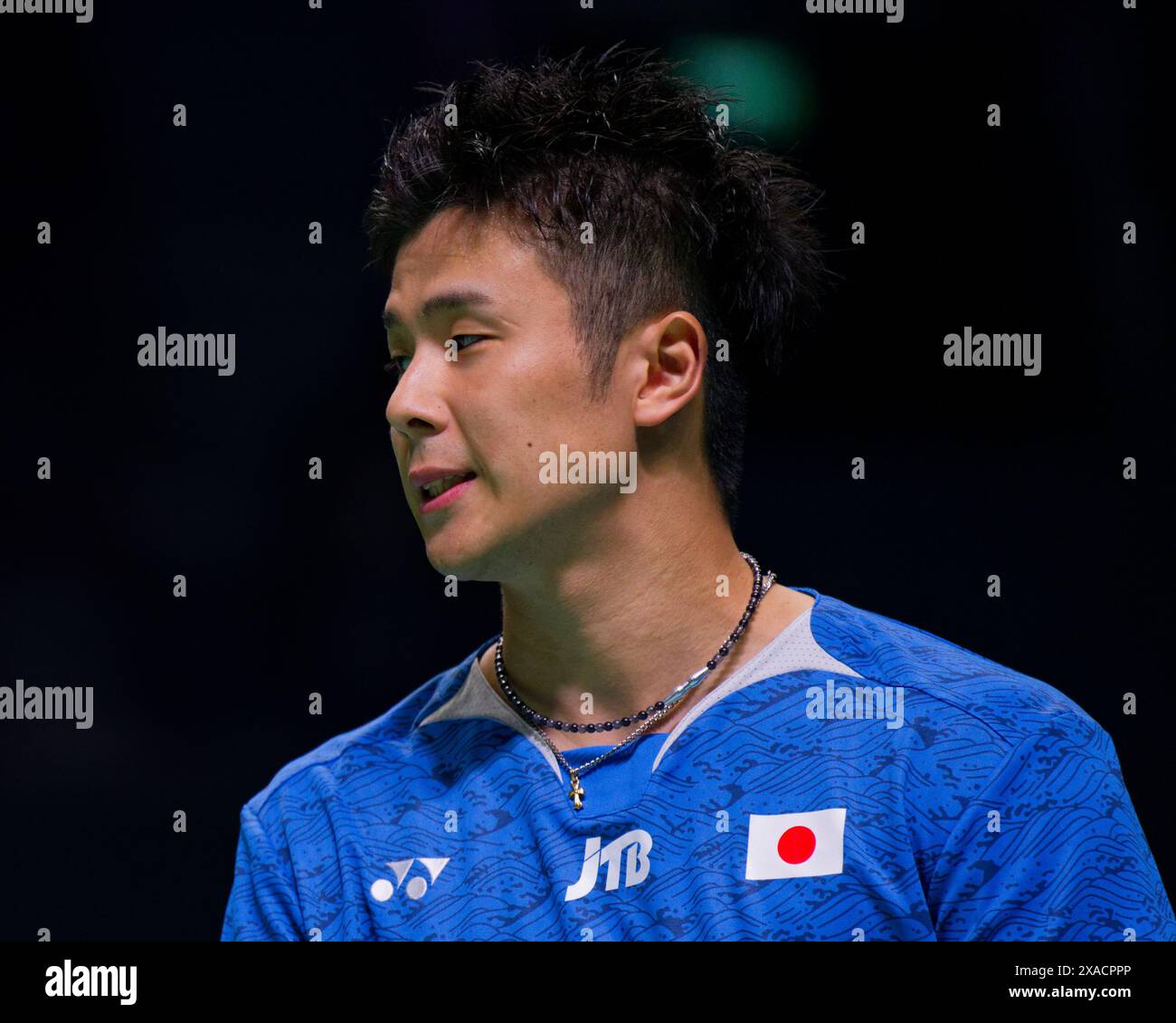 Yugo Kobayashi of Japan in action during the mens doubles match on day ...