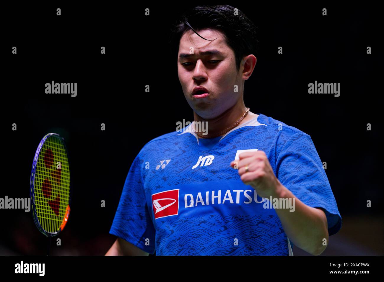 Takuro Hoki of Japan in action during the mens doubles match on day two ...