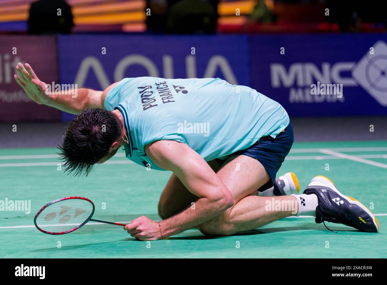 Toma Junior Popov of France in action during the singles match on day ...