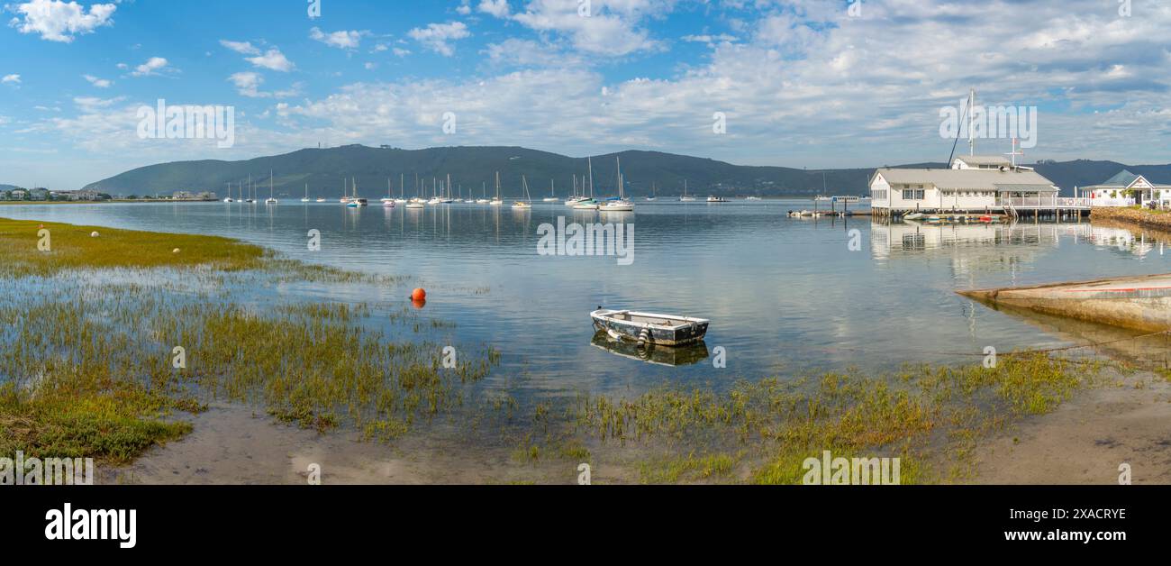 View of yachts and Knysna Yacht Club with Featherbed Nature Reserve in ...
