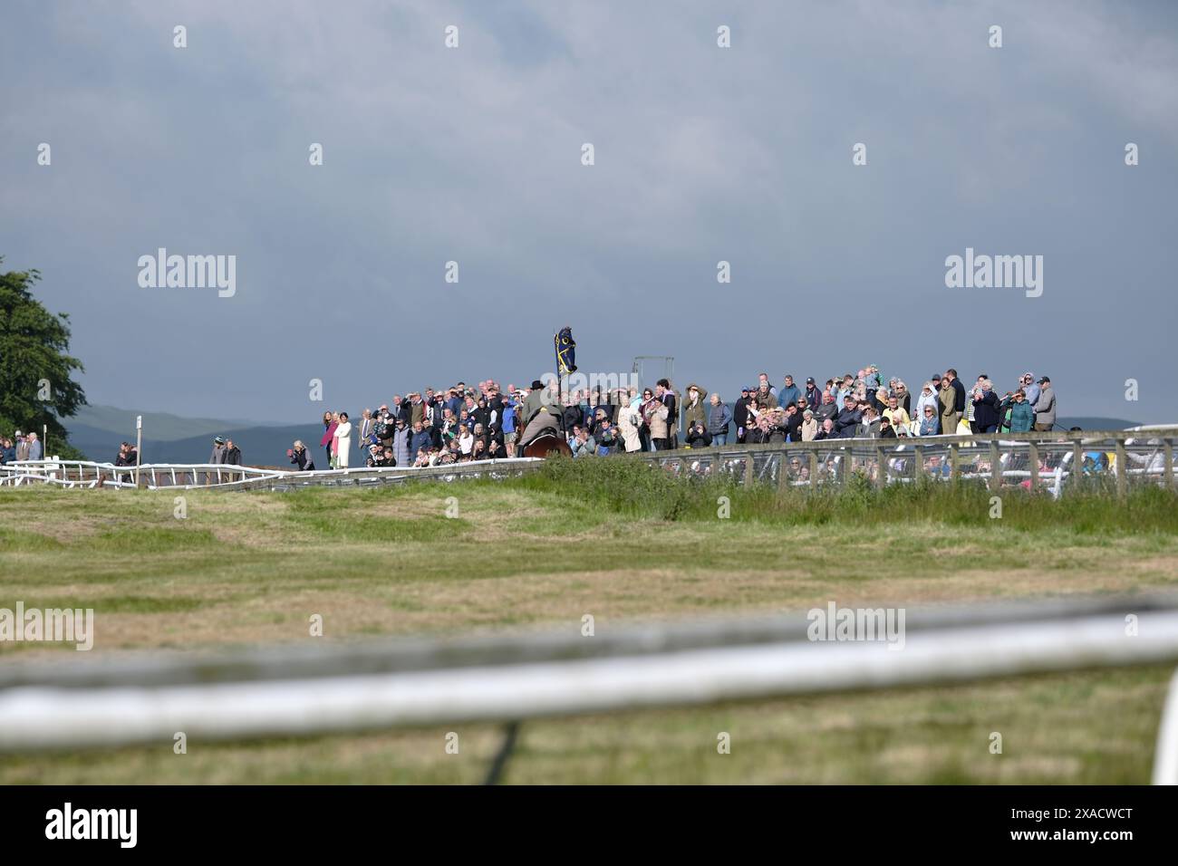 Hawick, UK. 06th June, 2024. Ryan Nichol carries the unbussed 'Banner ...