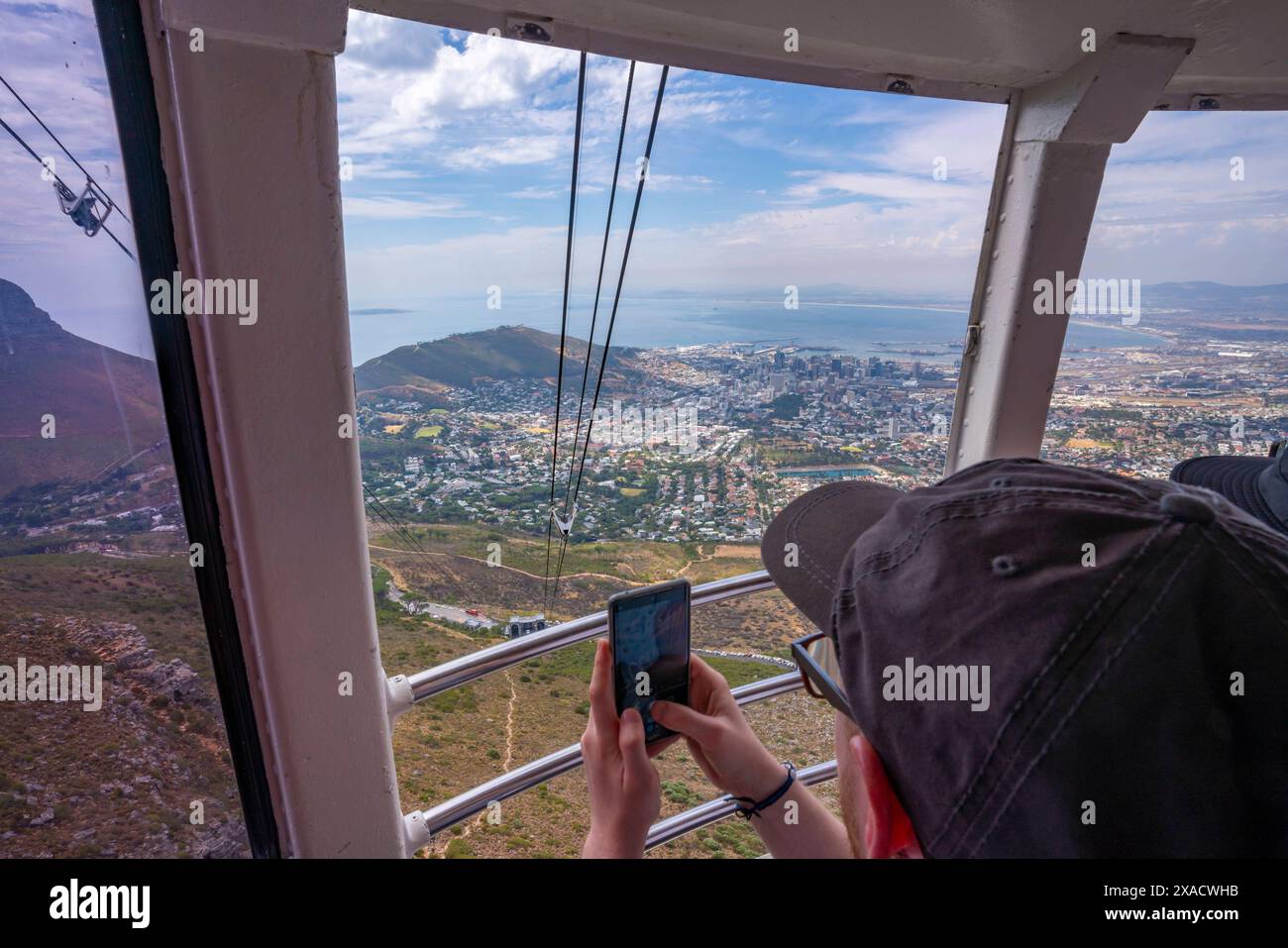View of man taking picture of Cape Town from Table Mountain Aerial ...