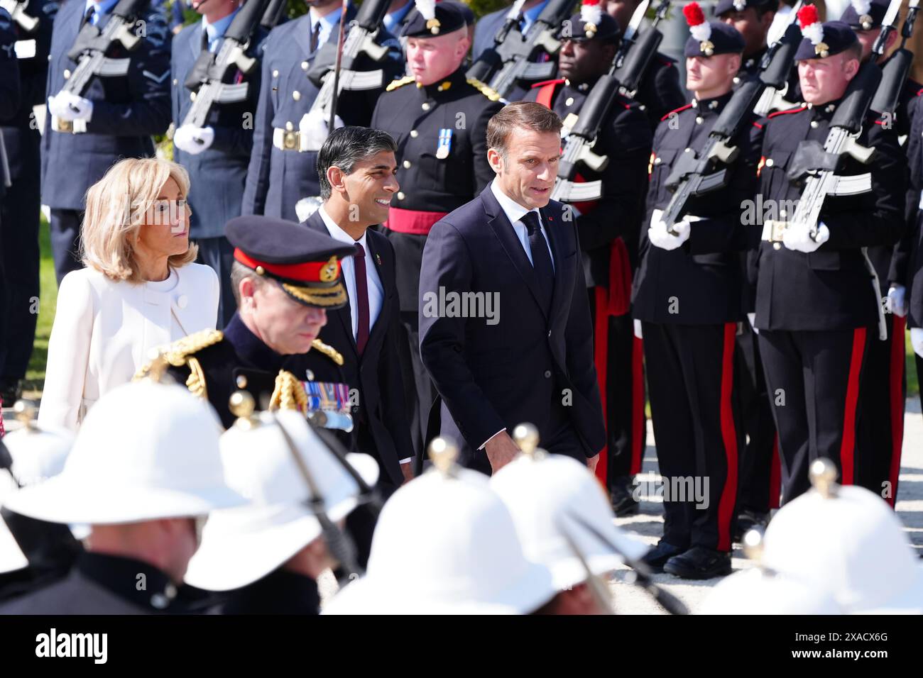 King Charles III greets French President Emmanuel Macron and wife ...