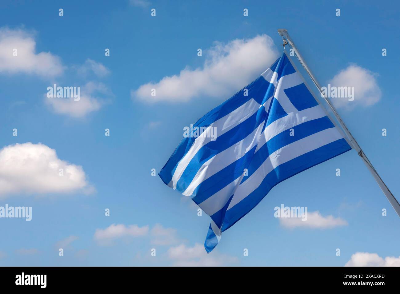 Greek flag waving in the wind, Greece Stock Photo - Alamy
