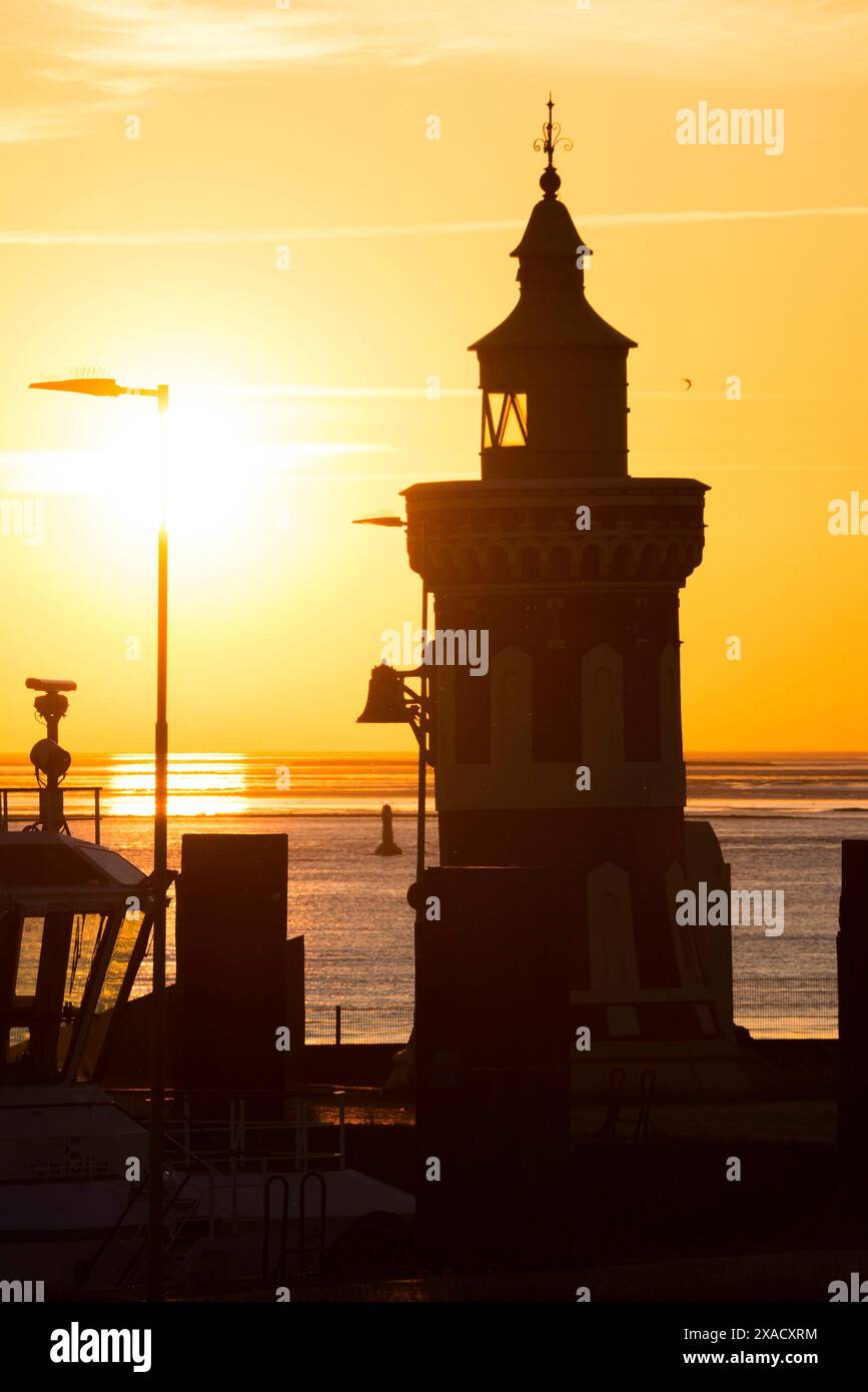 Pingelturm, historic lighthouse in the harbour, picturesque, golden ...