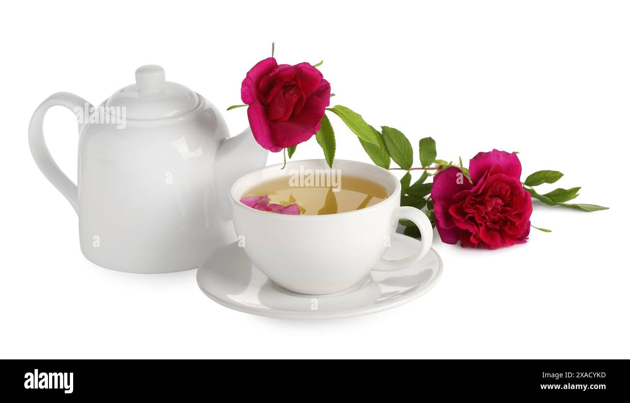 Aromatic herbal tea with rose flowers isolated on white Stock Photo - Alamy