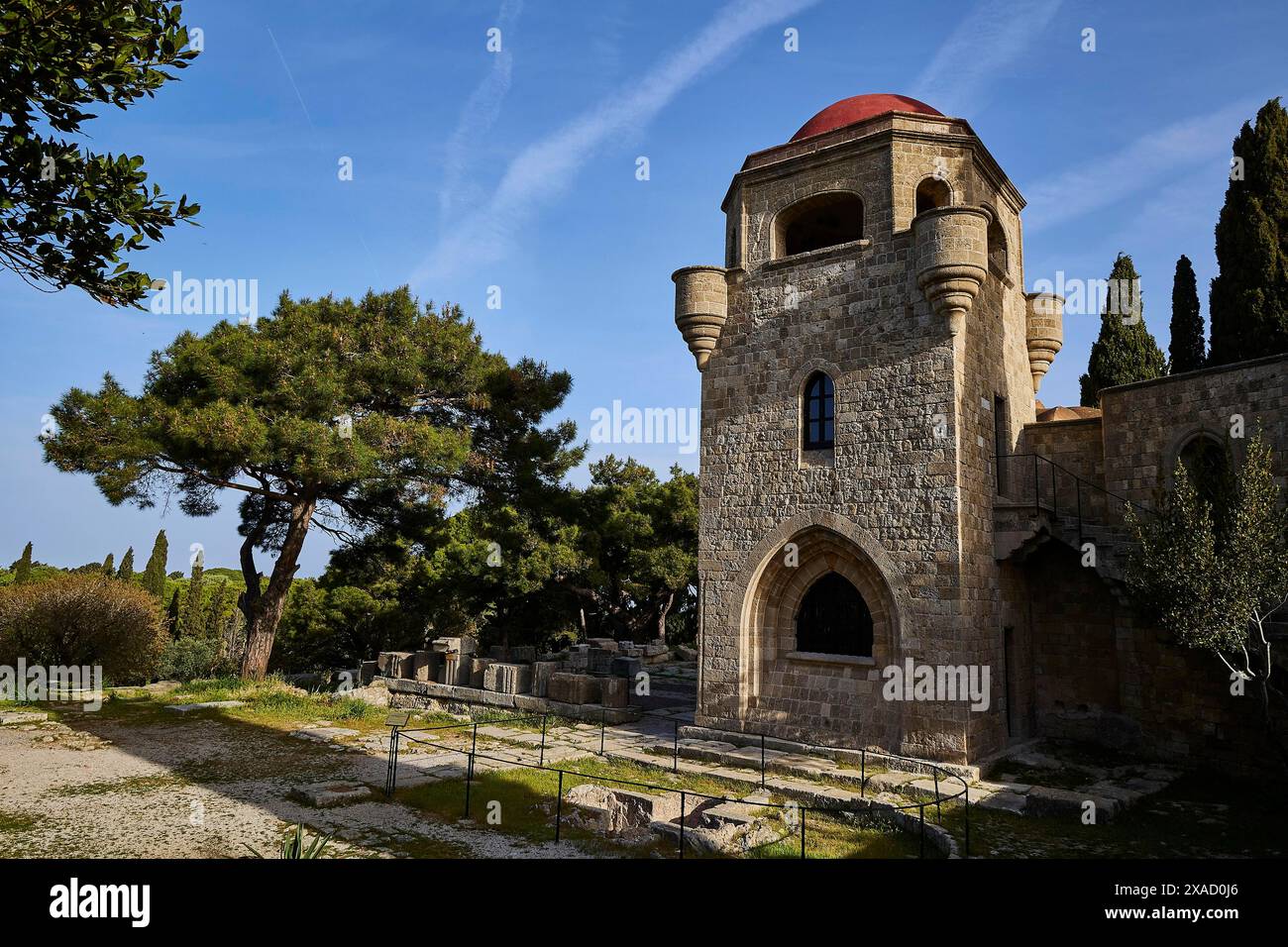 St John's Church, Ancient stone building with tower under a sunny sky ...