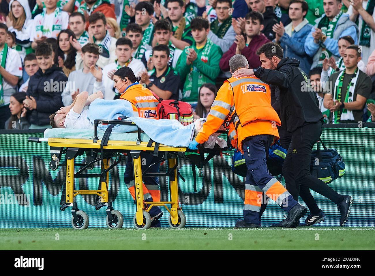Inigo Vicente of Real Racing Club is carried off on a stretcher after ...