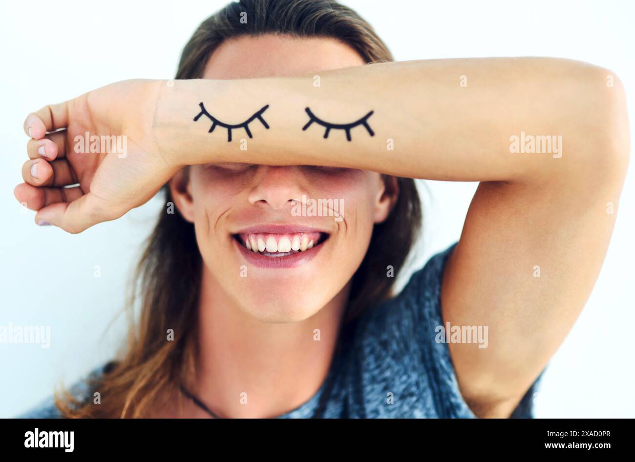 Happy teeth embarrassed smile hi-res stock photography and images - Alamy