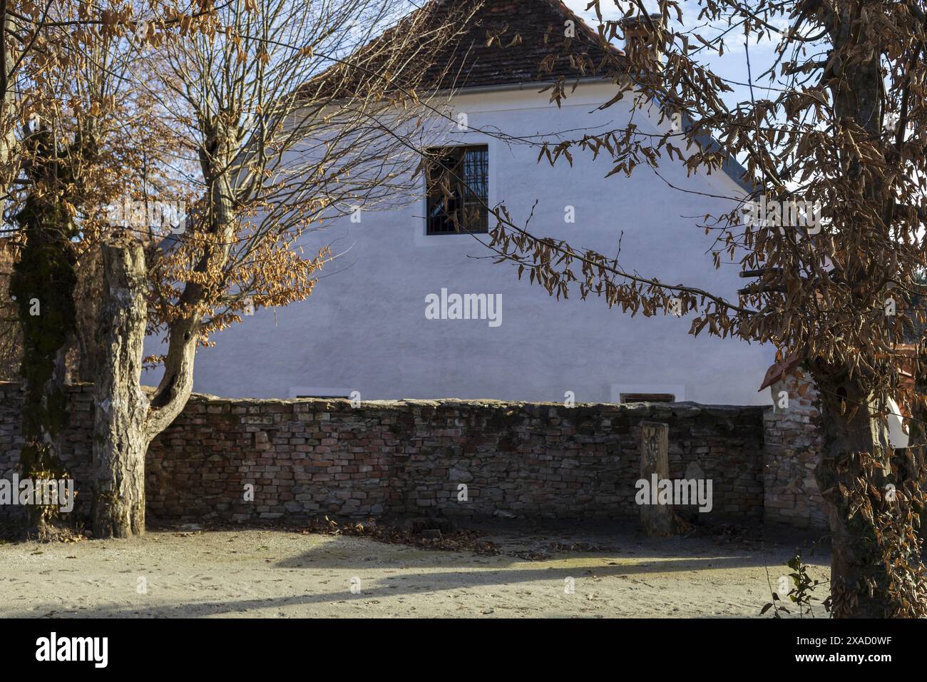 photography of an old traditional Alpine farmhouse with red tiled roof ...