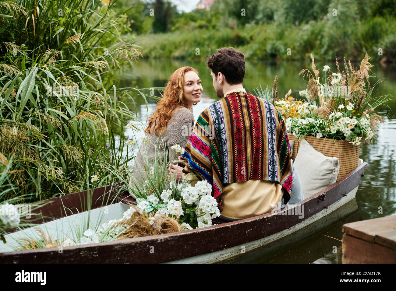 A stylish couple enjoying a romantic boat ride surrounded by vibrant ...