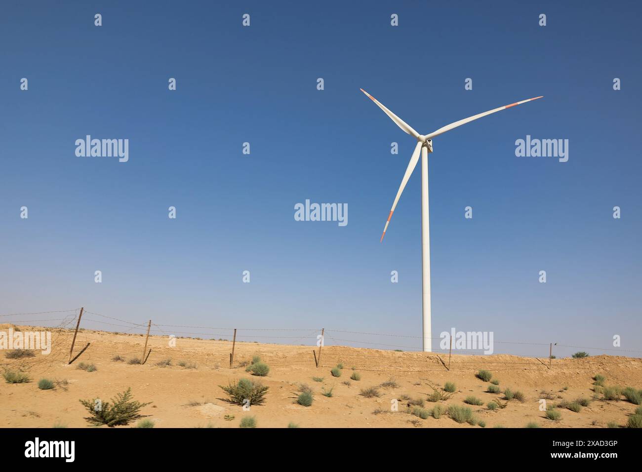 wind turbine for green energy production in desert area, Jordan Stock ...