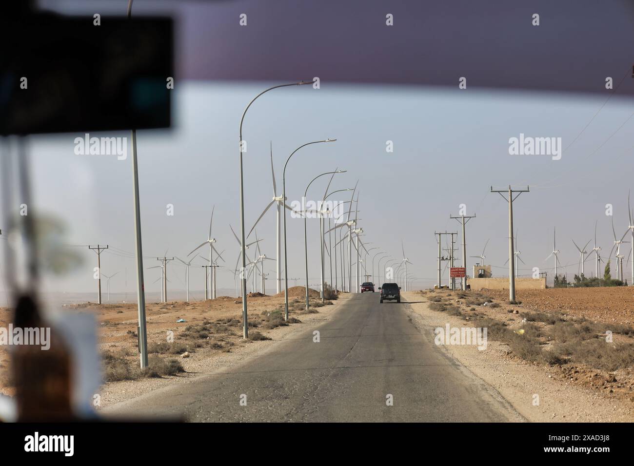 wind turbines for green electric power production along a Jordan road ...