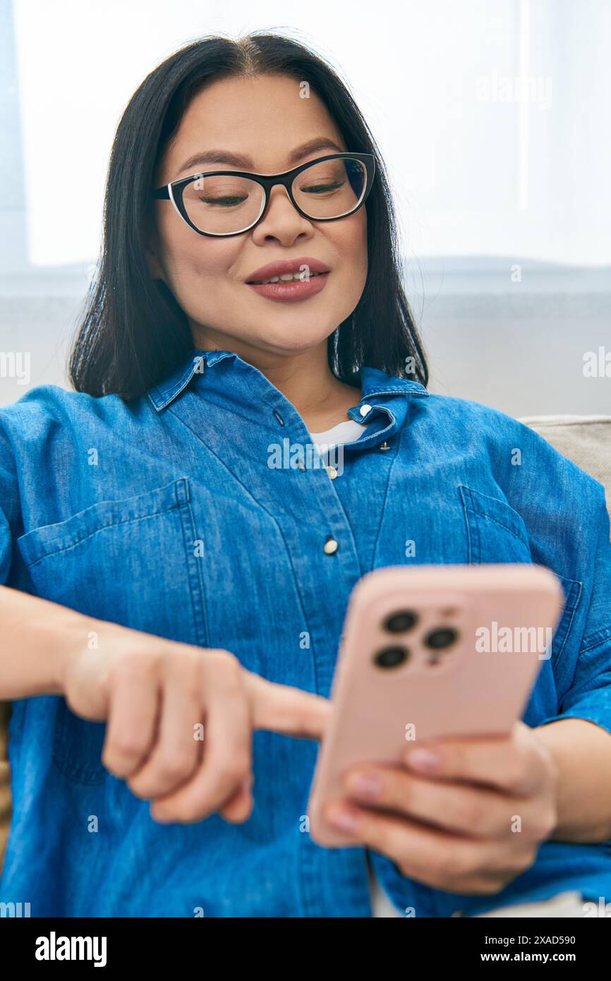 Asian daughter mother scrolling phone hi-res stock photography and ...