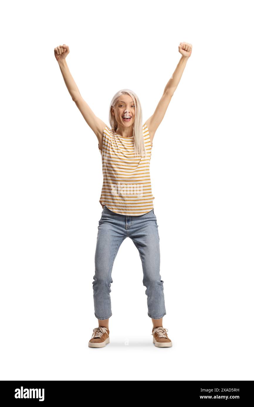 Happy young woman with arms up isolated on white background Stock Photo ...
