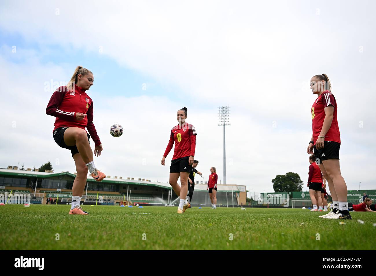 POZNAN, POLAND - 03 JUNE 2024: Wales' Charlie Estcourt, Wales' Georgia ...
