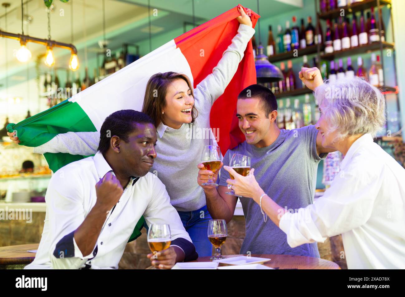 Extremely happy italian man and woman supporters waving national flag ...