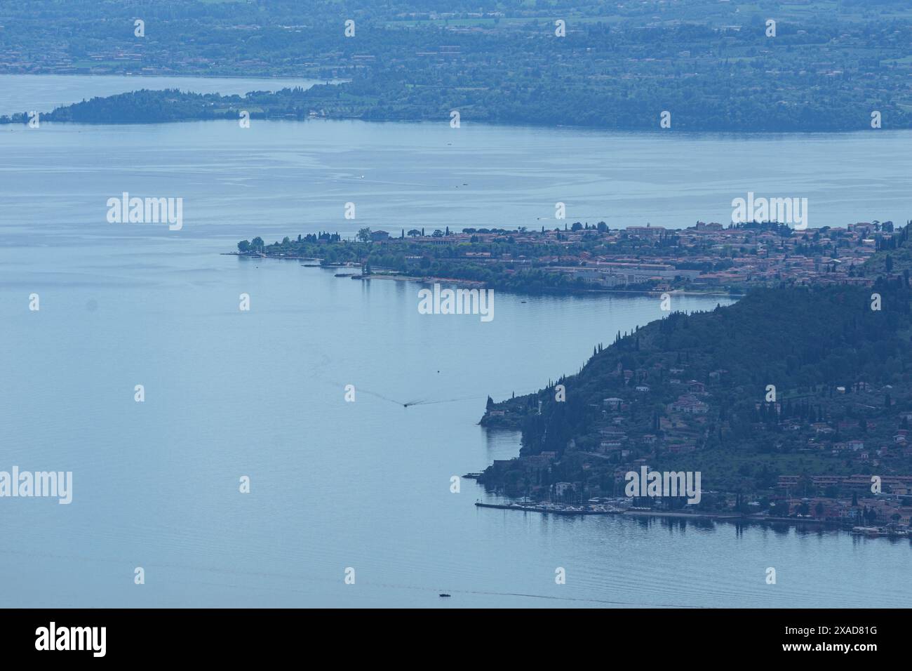The lake garda and the alps from the mountains around the town of ...