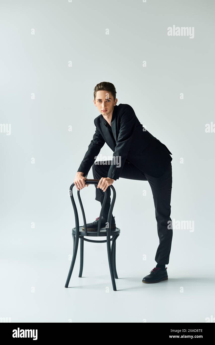 Man in formal attire leans hi-res stock photography and images - Alamy