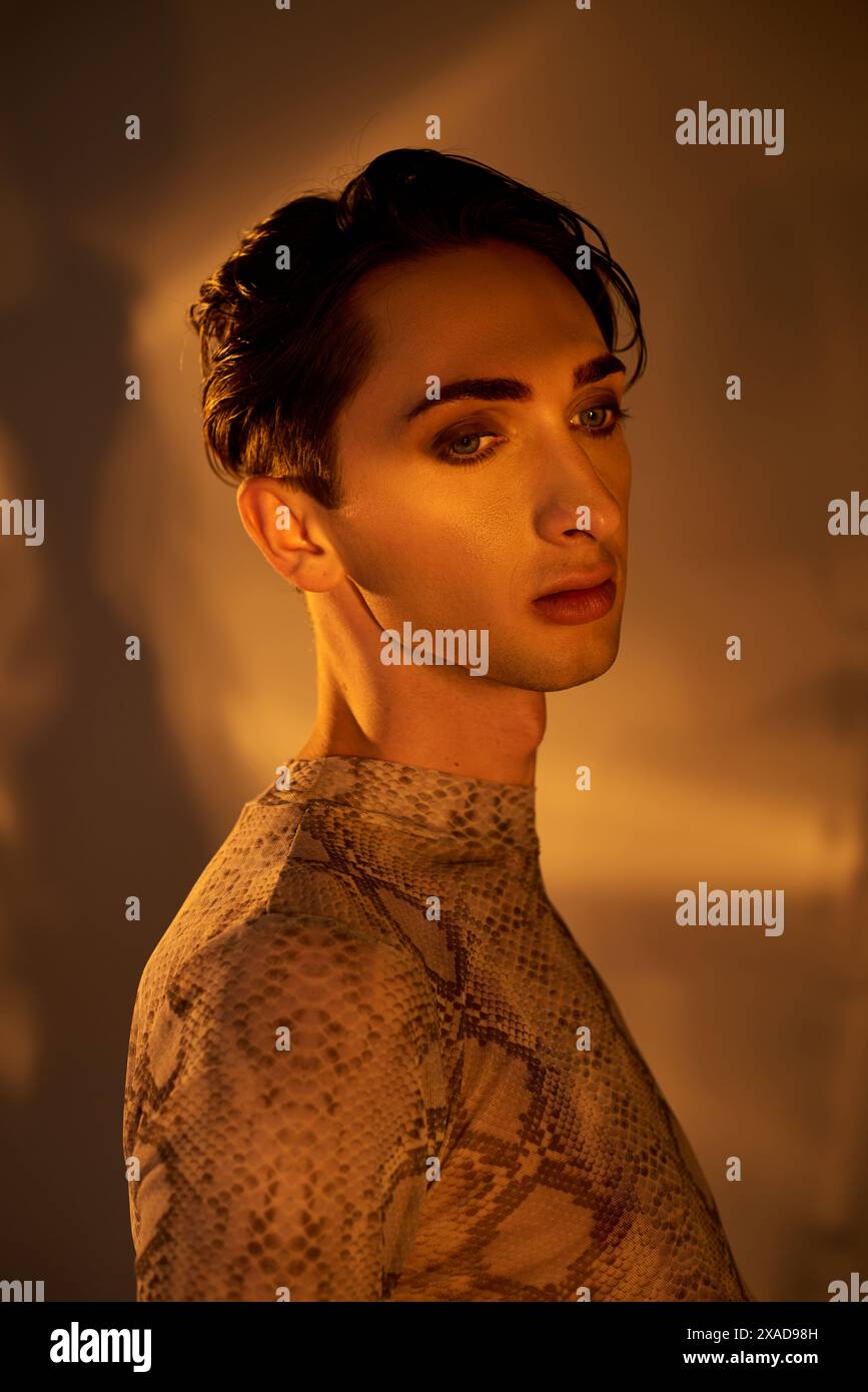 A young queer person in stylish attire stands introspectively before a ...