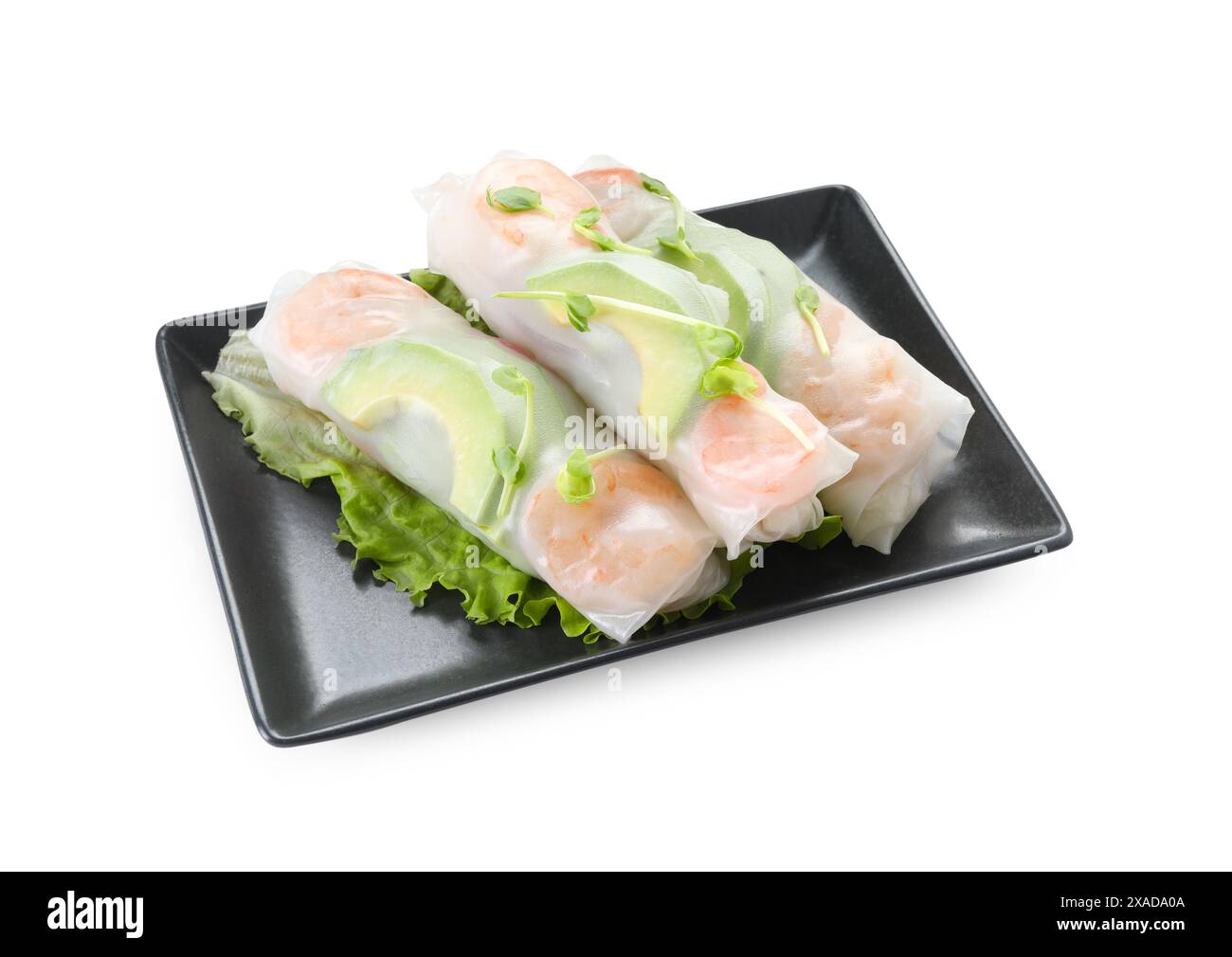 Delicious spring rolls wrapped in rice paper isolated on white Stock ...