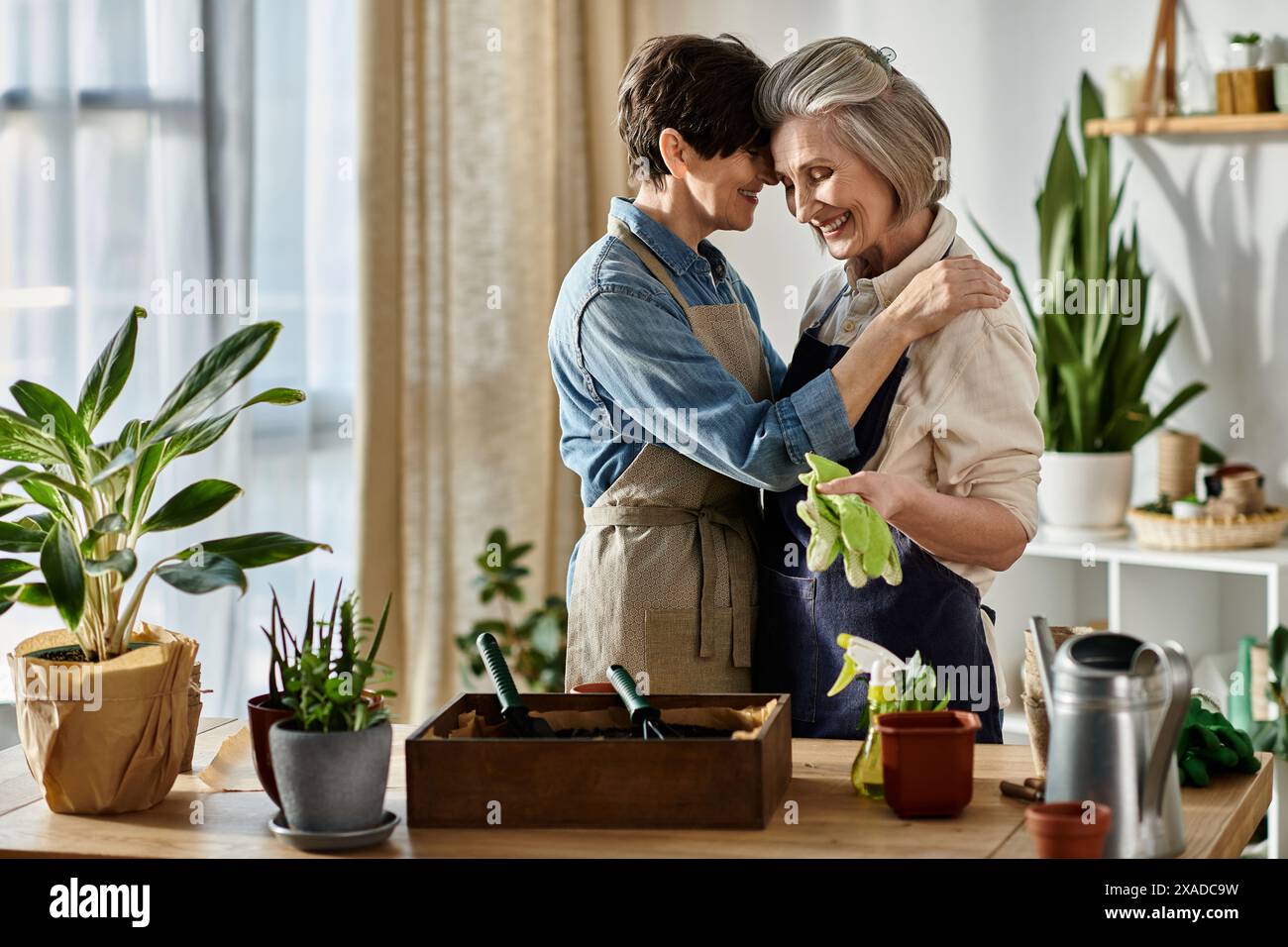 Two older women share a heartfelt hug in a cozy kitchen surrounded by ...