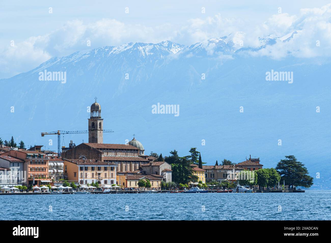 Lake garda, mountains and the town of Salò during a beautiful spring ...