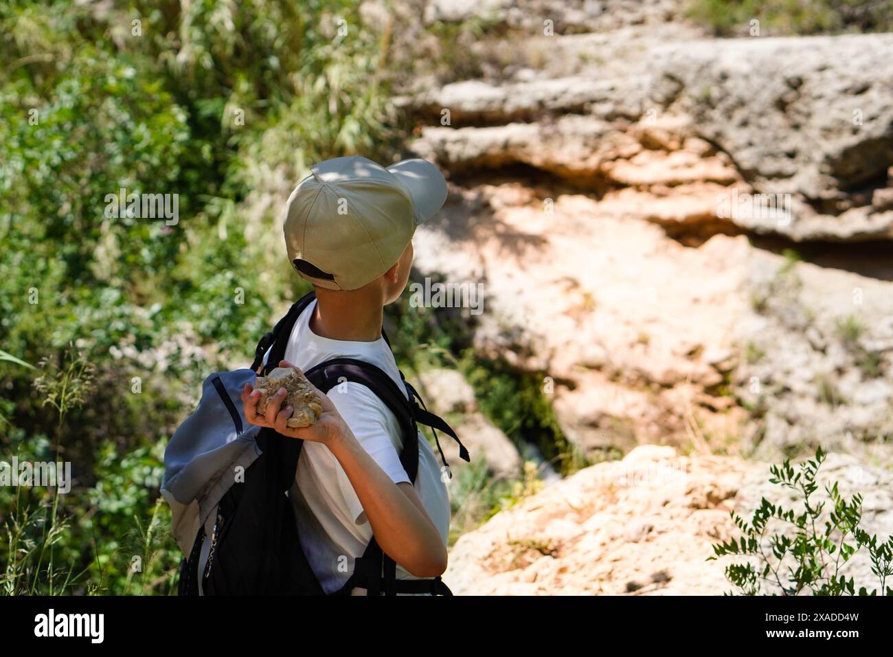 Young child throwing stones hi-res stock photography and images - Alamy