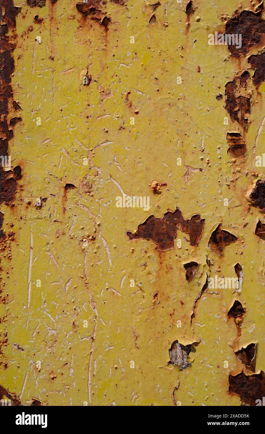 vertical background. rusty texture of corroded yellow painted metal ...