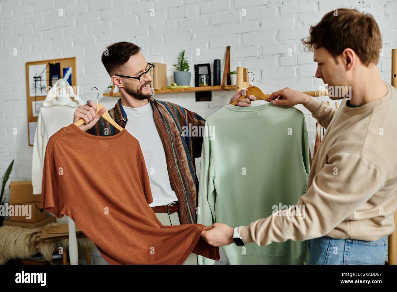 Two men standing together in a designer workshop, passionately creating ...