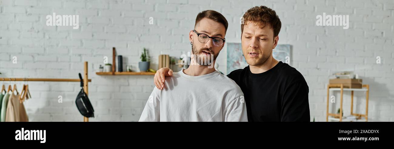Two men, a gay couple, collaborate in a designer workshop to create trendy attire Stock Photo ...