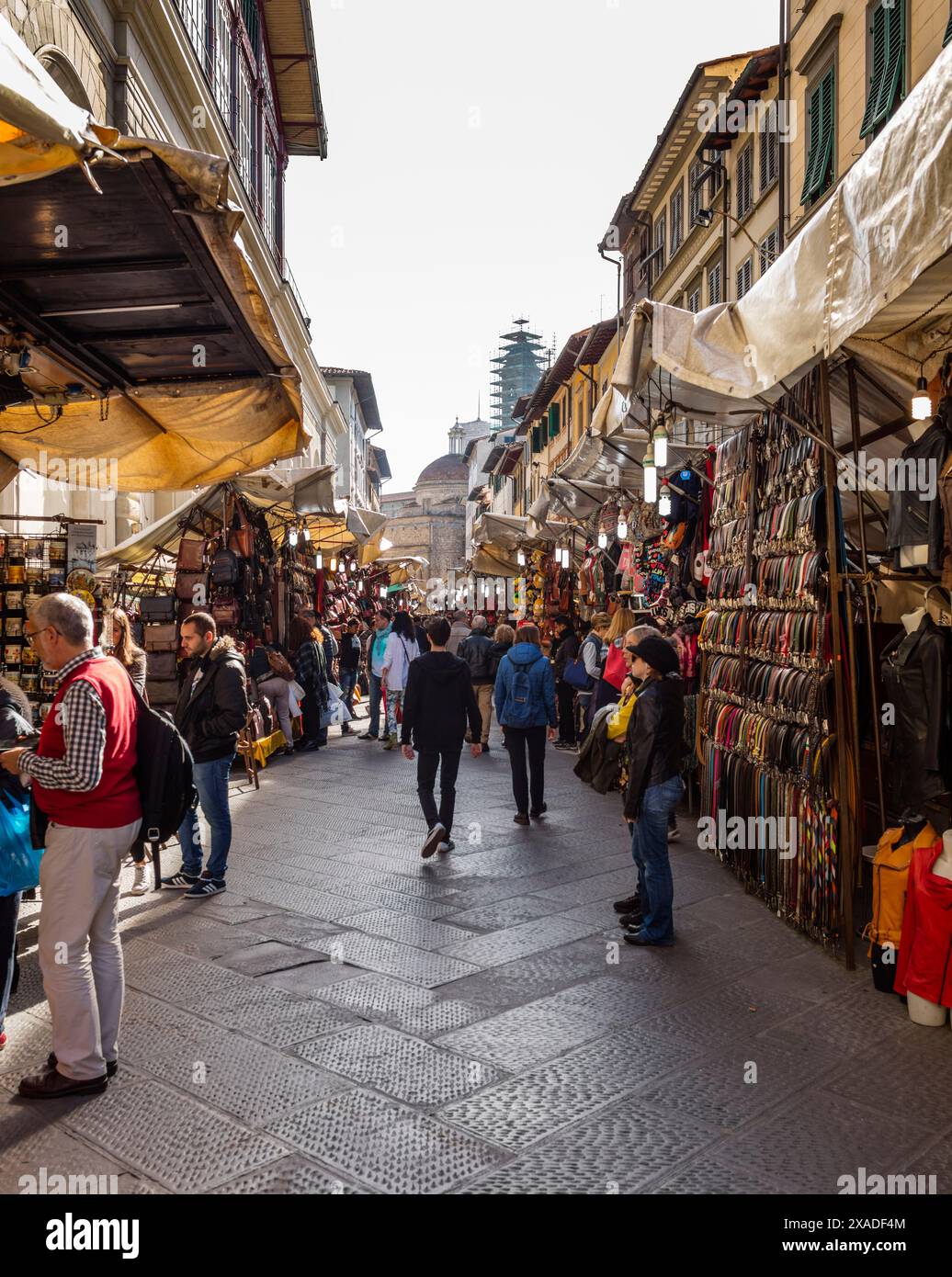 Florence, Italy. Market stalls and tourists walking in the Mercato di ...